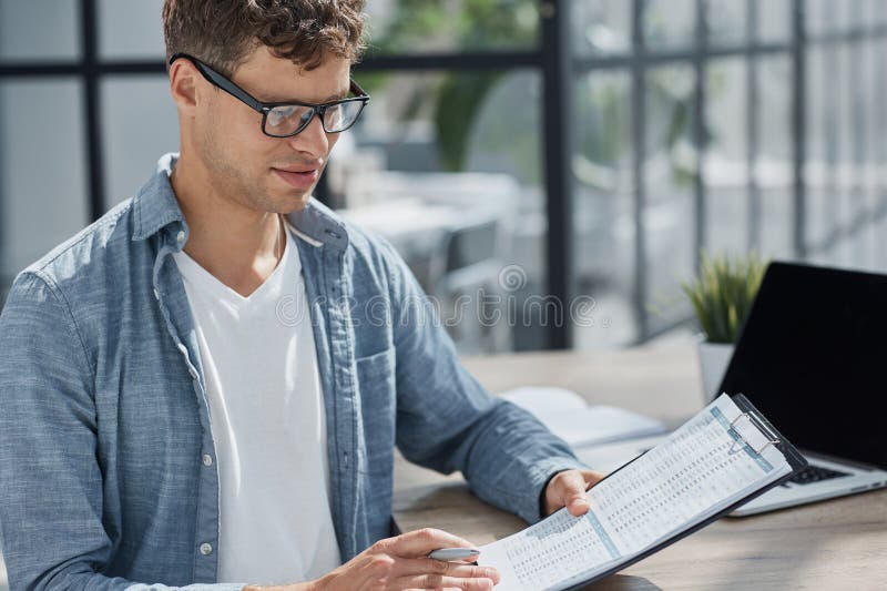 Young Office Man at Workplace Making Notes Stock Image - Image of ...