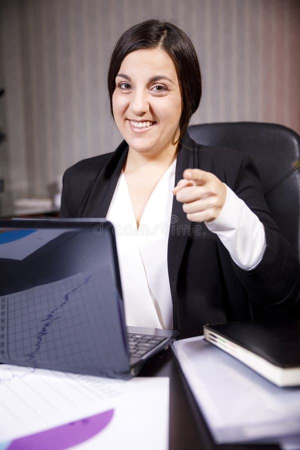 Young Office Worker Girl Dressed in a Suit Sitting at Desktop Stock ...
