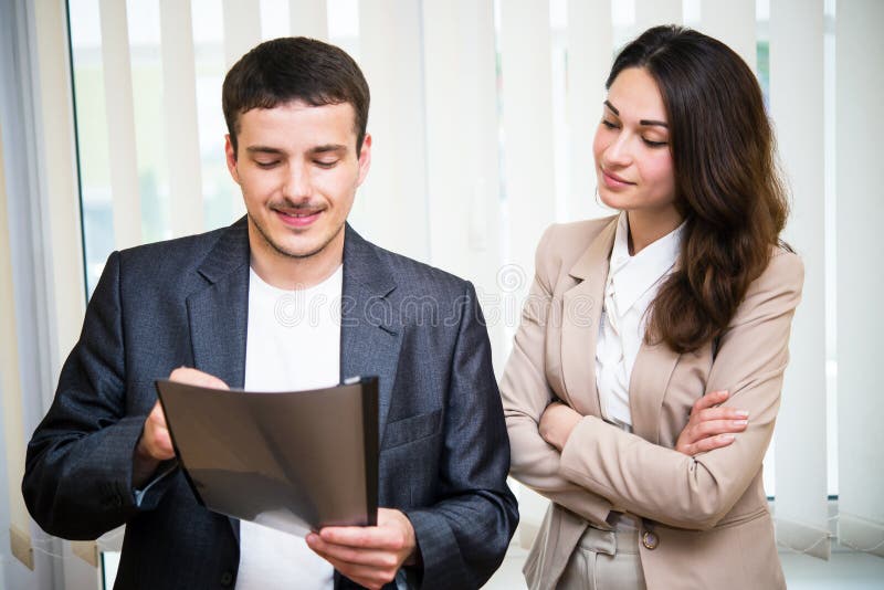 A Young Office Worker Reports To the Manager Stock Photo - Image of ...