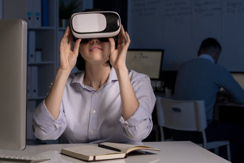 Young Office Worker with Vr Headset Sitting by Desk in Front of ...