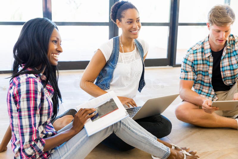 Young Office Workers Discussing Stock Photo - Image of busy, partners ...