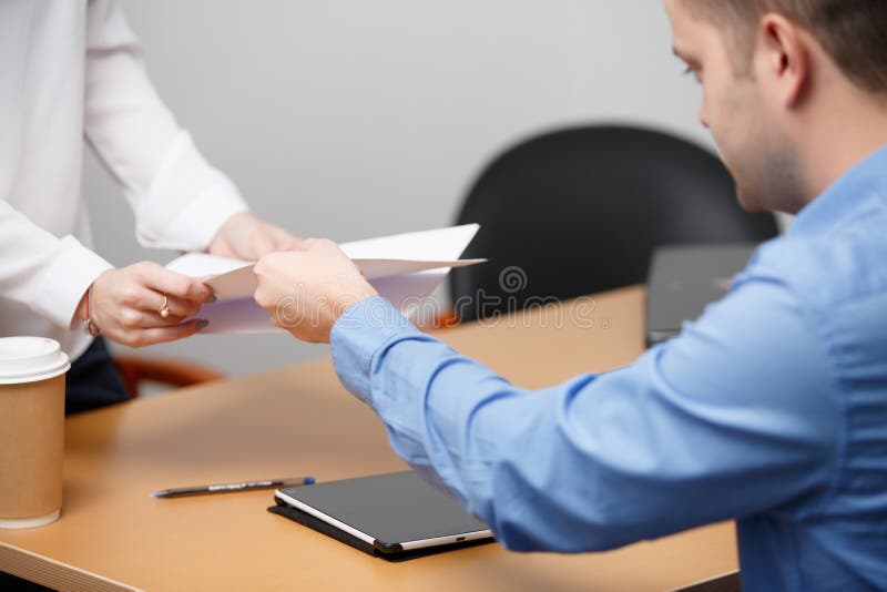 Young Office Workers with Papers Stock Photo - Image of papers, room ...