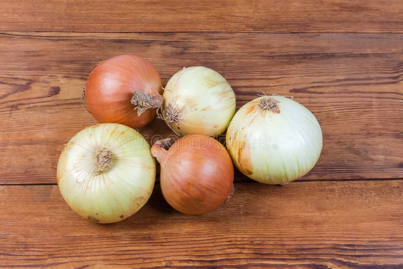 Young and Old Bulb Onions on the Rustic Table Stock Photo - Image of ...