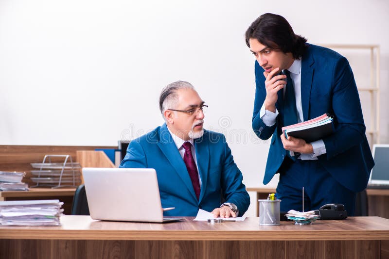 Young and Old Employees Working Together in the Office Stock Image ...