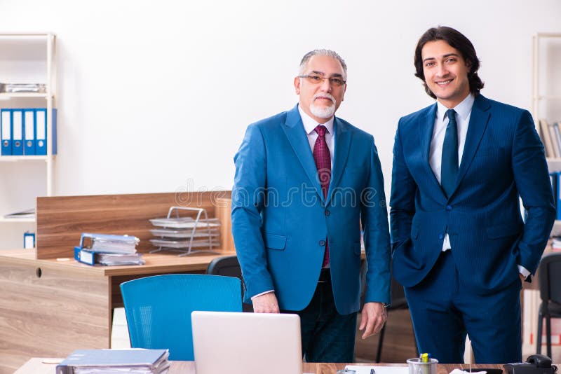 Young and Old Employees Working Together in the Office Stock Image ...