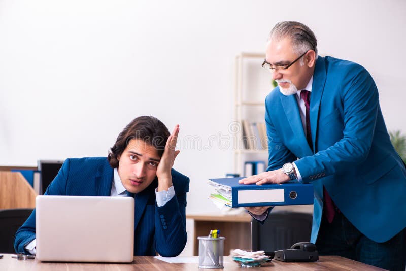 Young and Old Employees Working Together in the Office Stock Photo ...
