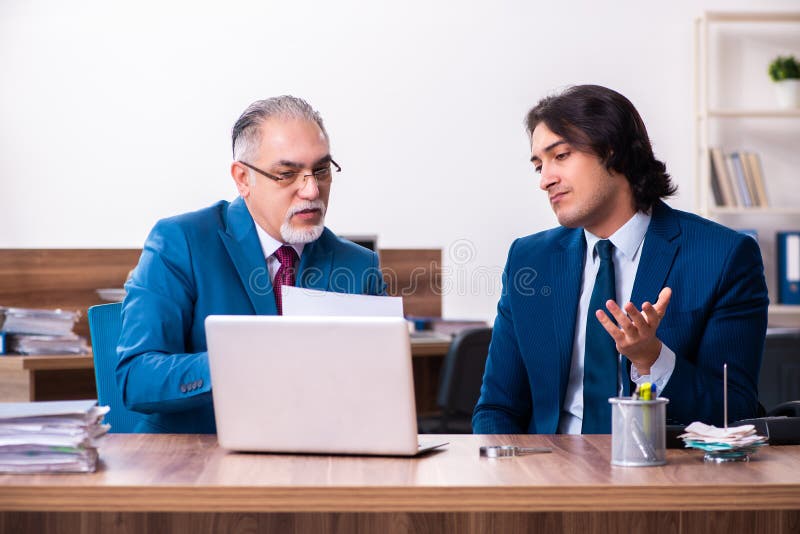 Young and Old Employees Working Together in the Office Stock Image ...