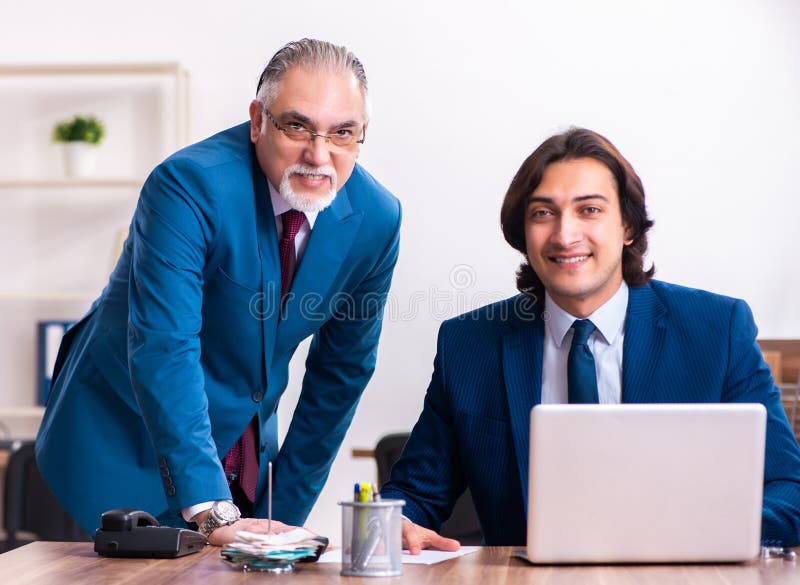 Young and Old Employees Working Together in the Office Stock Photo ...