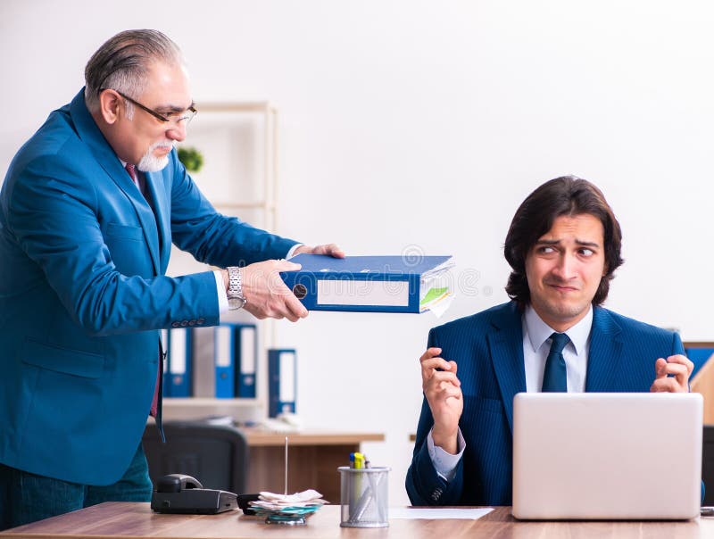 Young and Old Employees Working Together in the Office Stock Image ...
