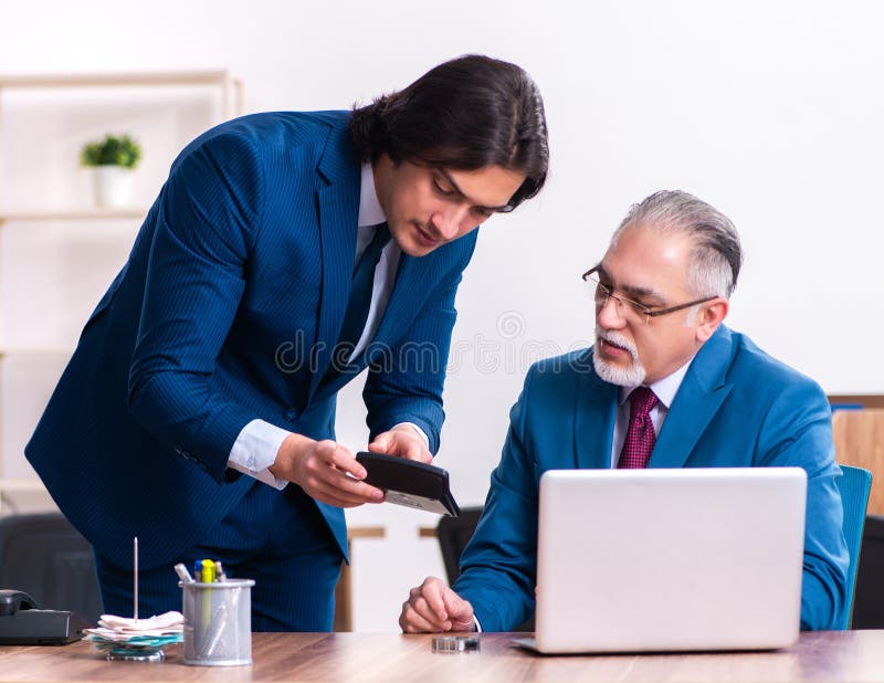 Young and Old Employees Working Together in the Office Stock Photo ...