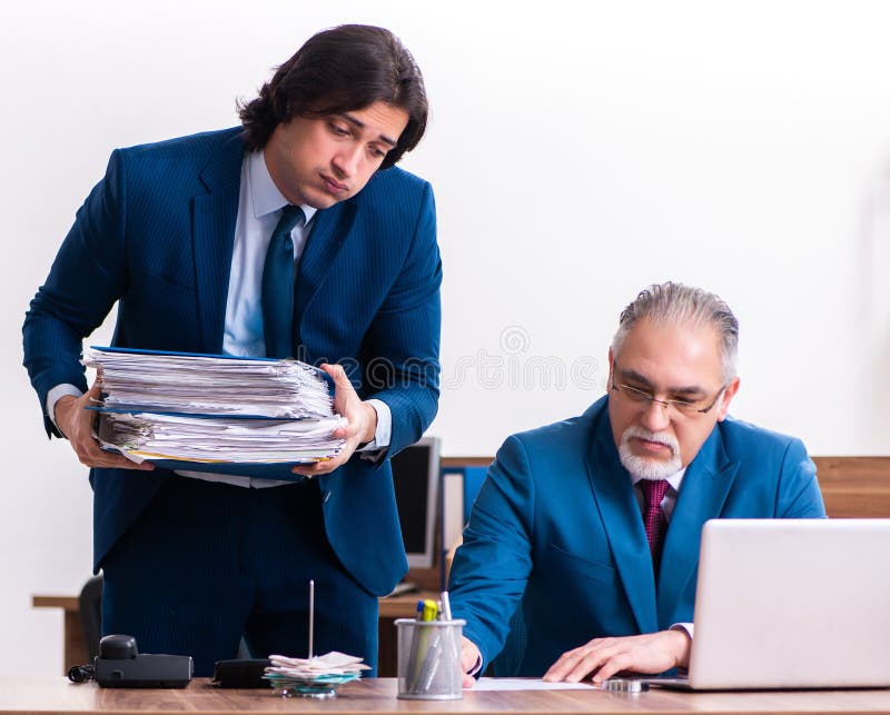 Young and Old Employees Working Together in the Office Stock Photo ...