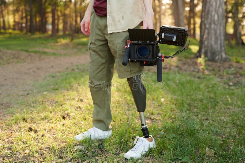 Young Operator with Robotic Leg Holding Camera Stock Image - Image of ...