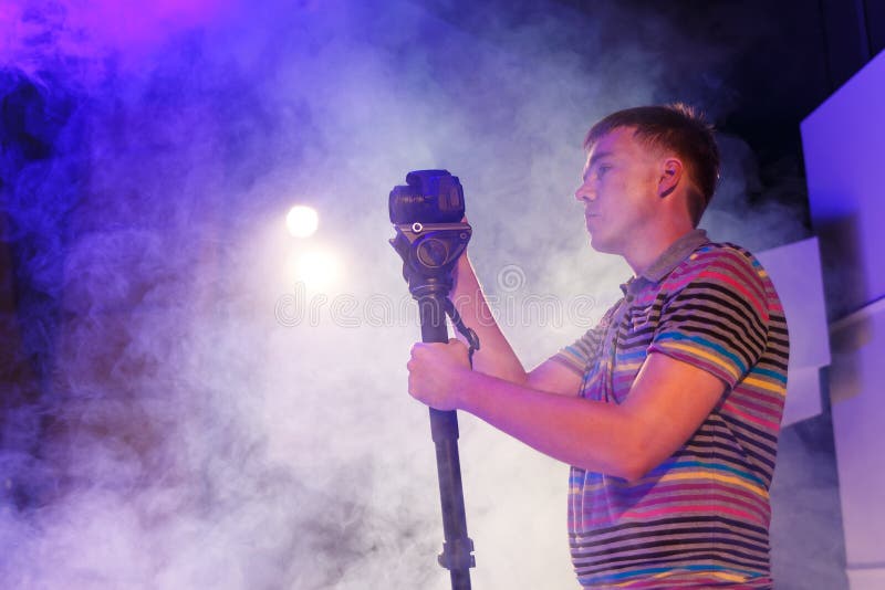 Young operator shoots stock image. Image of male, maker - 74900003