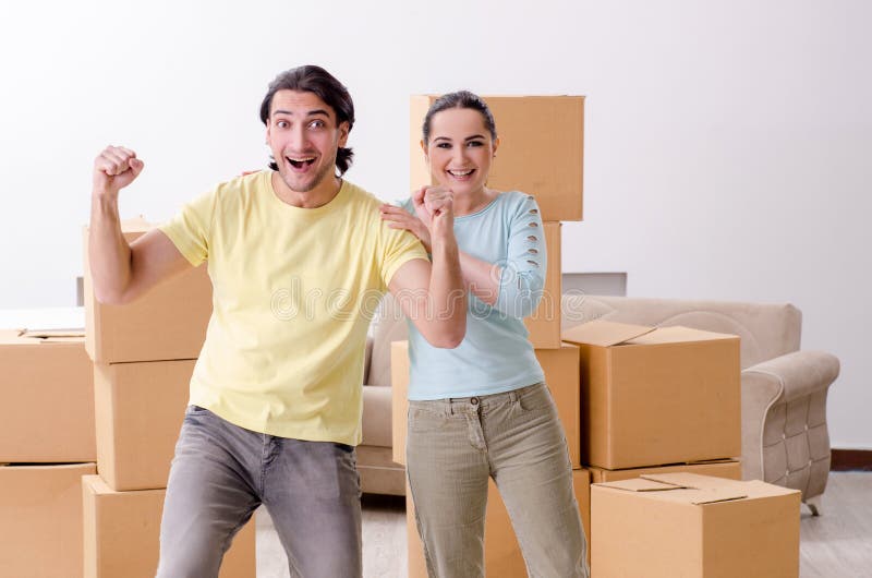 The Young Pair Moving To New Apaprtment Stock Image - Image of home ...