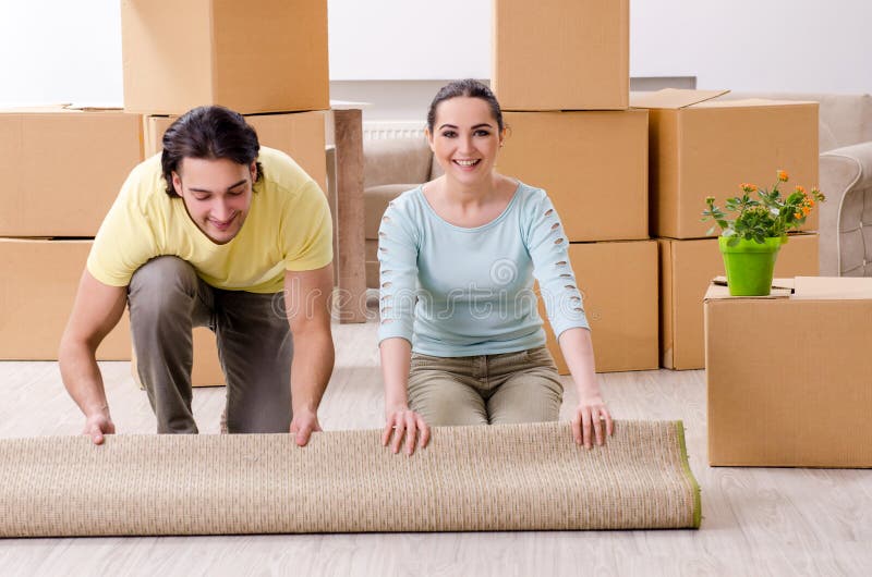 The Young Pair Moving To New Apaprtment Stock Image - Image of packers ...