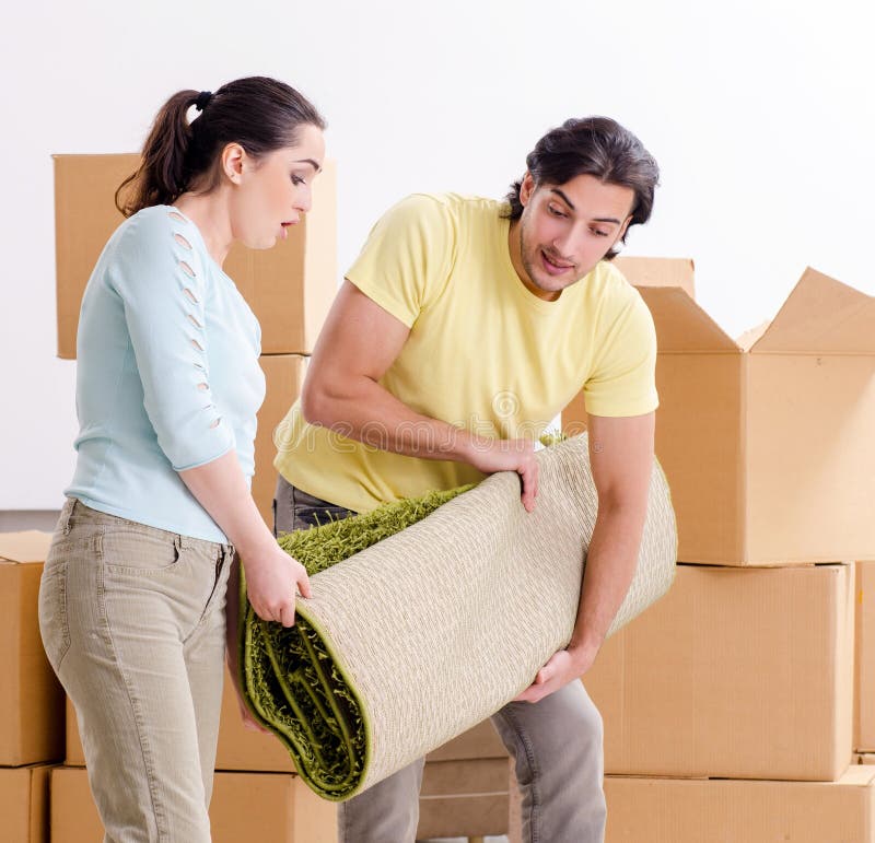 Young Pair Moving To New Apaprtment Stock Photo - Image of family ...