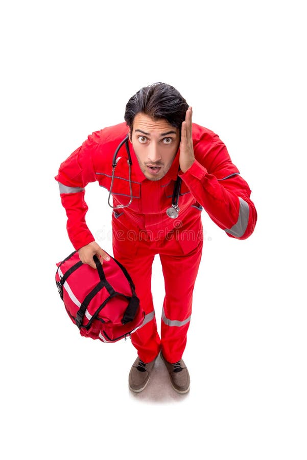 The Young Paramedic in Red Uniform Isolated on White Stock Image ...
