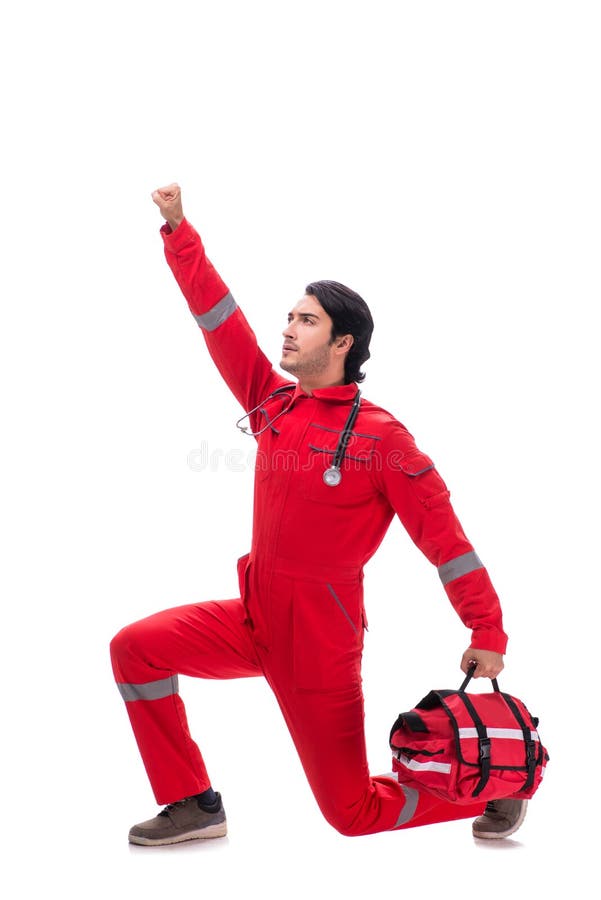 The Young Paramedic in Red Uniform Isolated on White Stock Photo ...