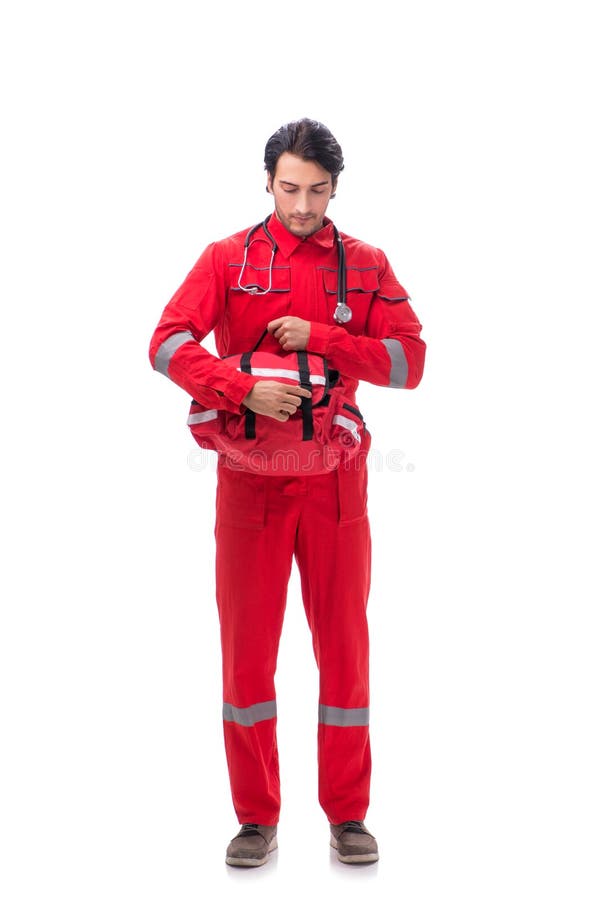 The Young Paramedic in Red Uniform Isolated on White Stock Photo ...