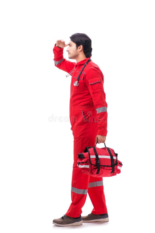 The Young Paramedic in Red Uniform Isolated on White Stock Photo ...