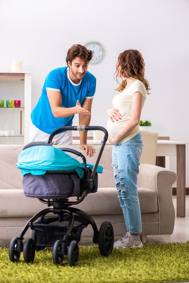 The Young Parents with Baby Expecting New Arrival Stock Image - Image ...