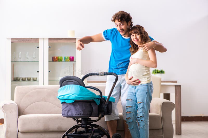 The Young Parents with Baby Expecting New Arrival Stock Image - Image ...