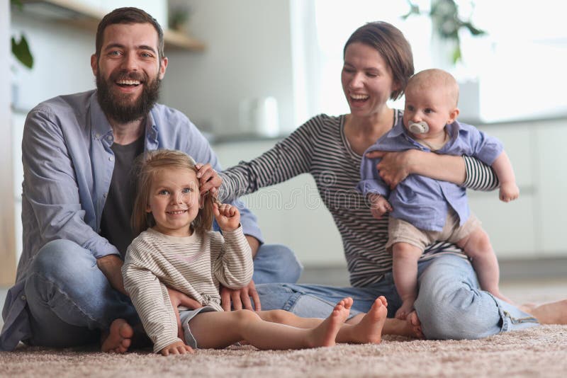Young Parents Playing with Children in the Kitchen Stock Image - Image ...
