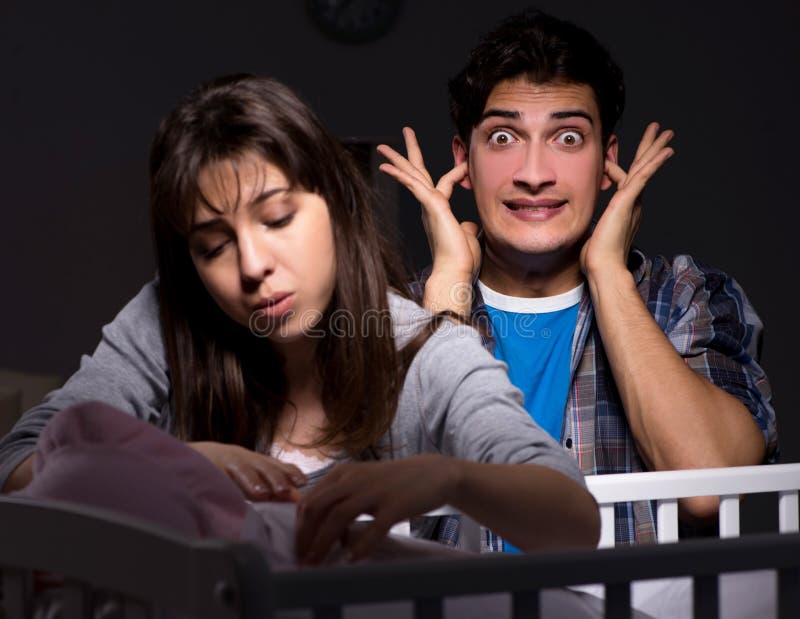 The Young Parents Sleepless with Newborn Baby at Night Stock Image ...