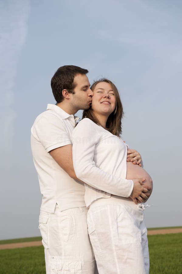Young parents to be stock photo. Image of outdoors, smiling - 24046050