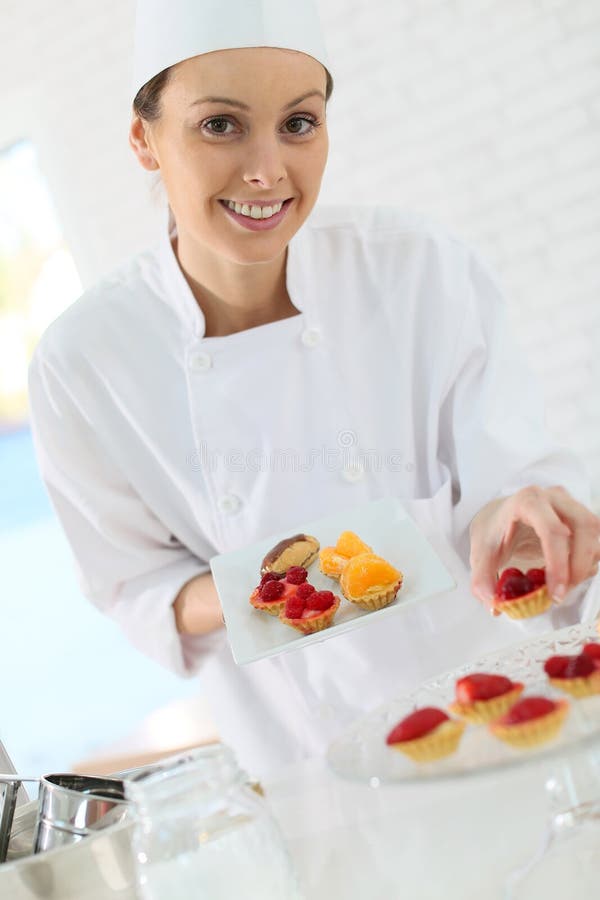 Young Pastry Chef Preparing Little Pastries Stock Image - Image of ...