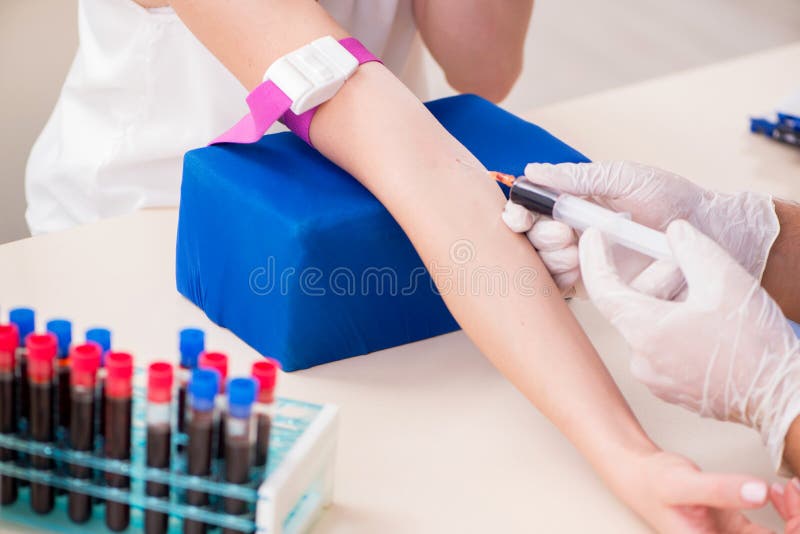 The Young Patient during Blood Test Sampling Procedure Stock Photo ...