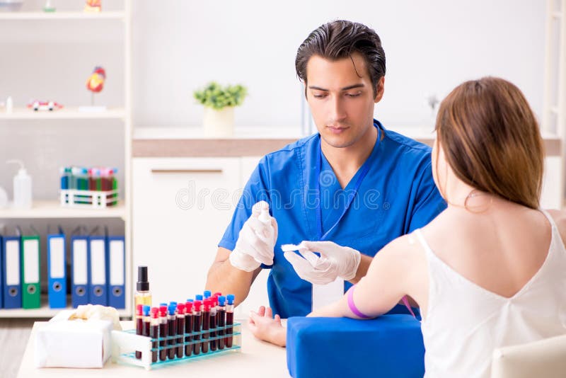 The Young Patient during Blood Test Sampling Procedure Stock Photo ...