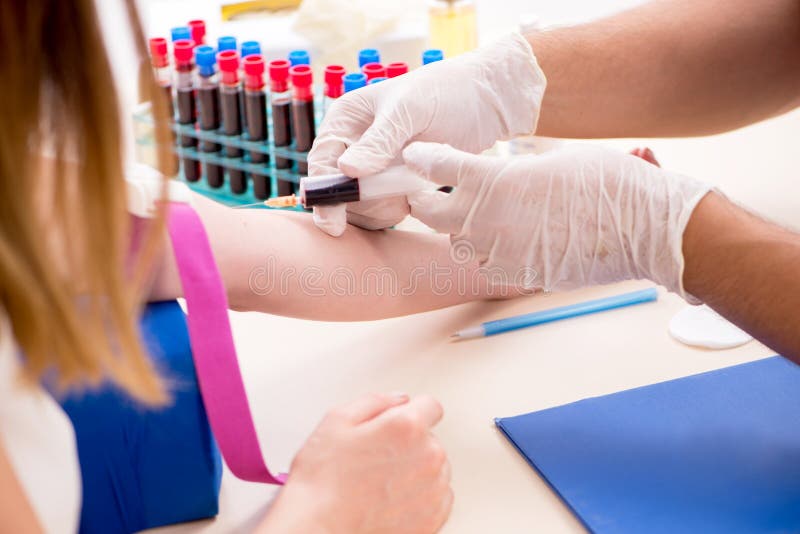 The Young Patient during Blood Test Sampling Procedure Stock Photo ...