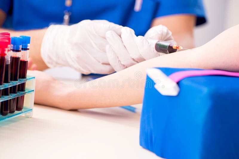 The Young Patient during Blood Test Sampling Procedure Stock Image ...