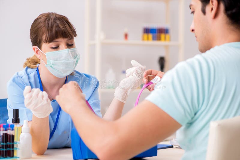 The Young Patient during Blood Test Sampling Procedure Stock Image ...