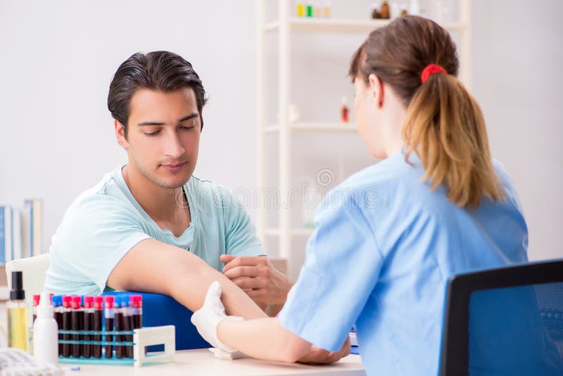 The Young Patient during Blood Test Sampling Procedure Stock Photo ...