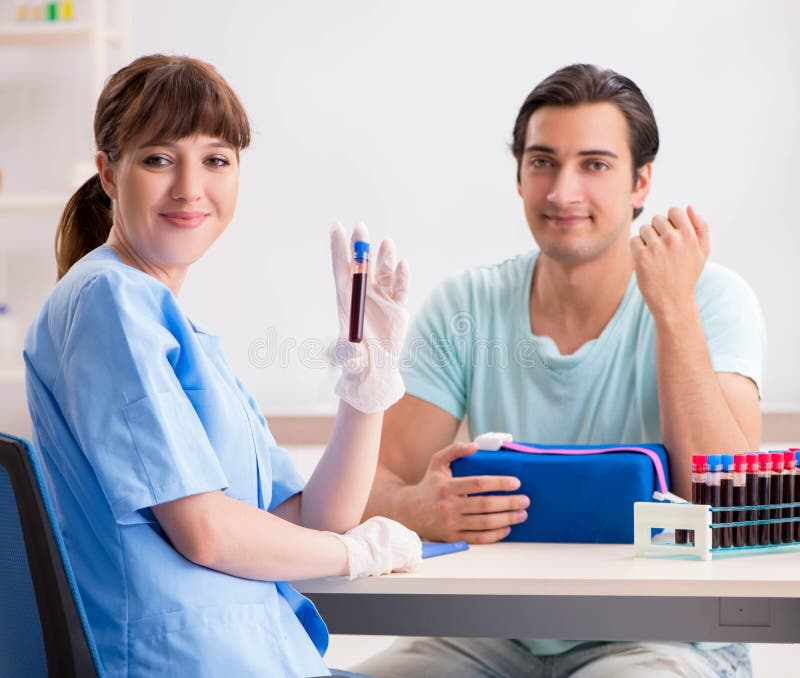 The Young Patient during Blood Test Sampling Procedure Stock Photo ...