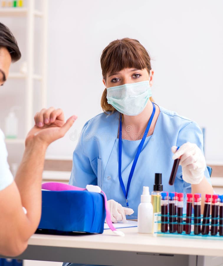 The Young Patient during Blood Test Sampling Procedure Stock Photo ...