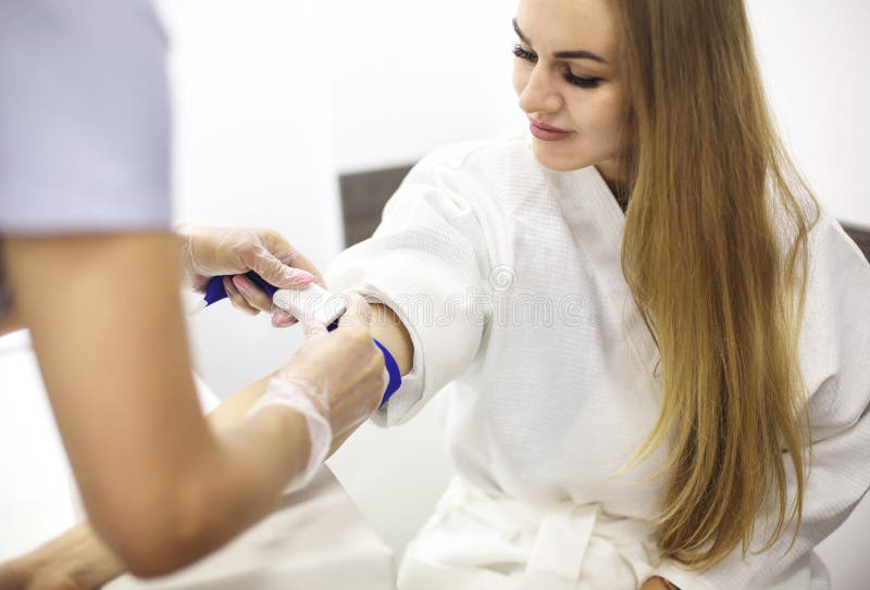 Young Patient during Blood Test Sampling Procedure Stock Photo - Image ...