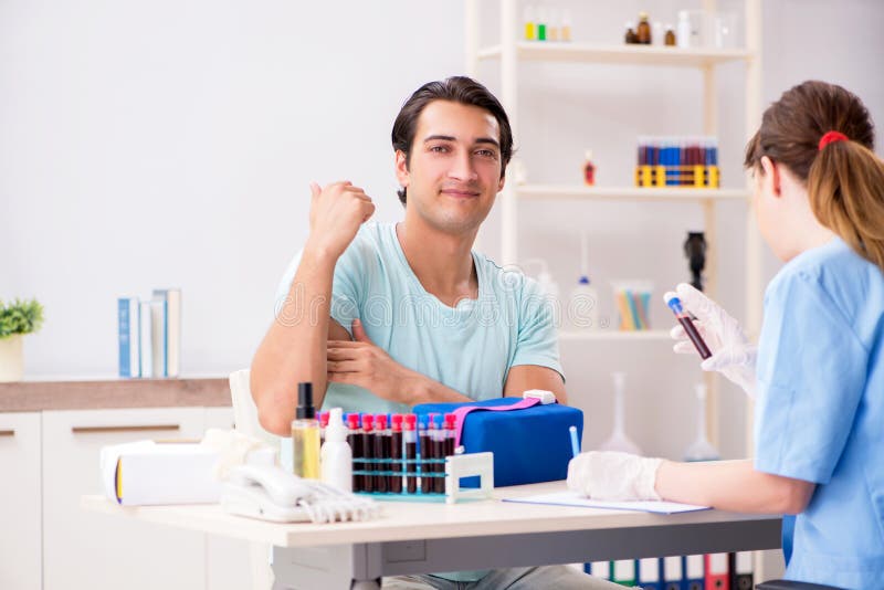 The Young Patient during Blood Test Sampling Procedure Stock Photo ...