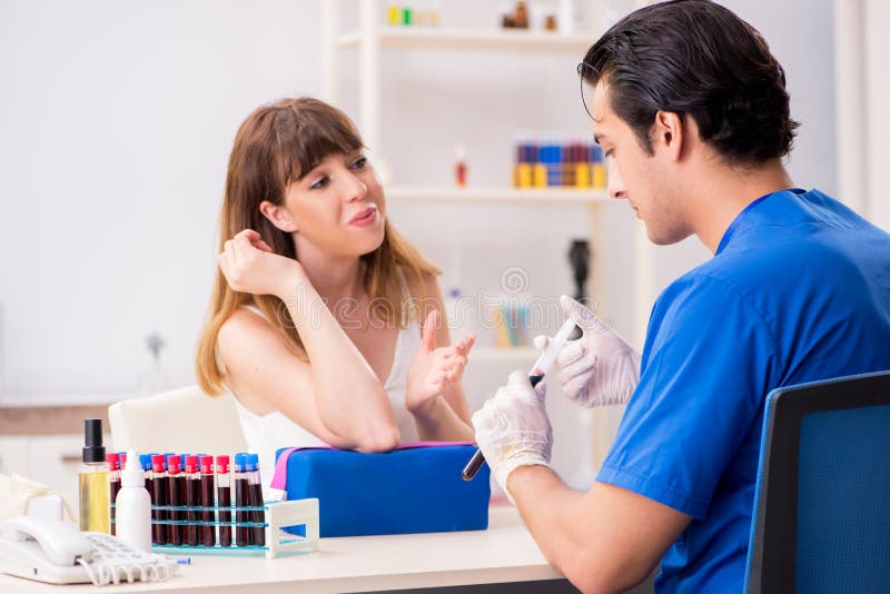 The Young Patient during Blood Test Sampling Procedure Stock Image ...