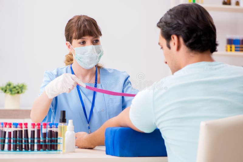 The Young Patient during Blood Test Sampling Procedure Stock Photo ...