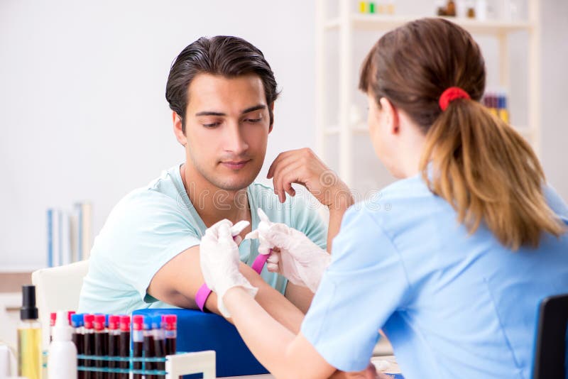 The Young Patient during Blood Test Sampling Procedure Stock Image ...