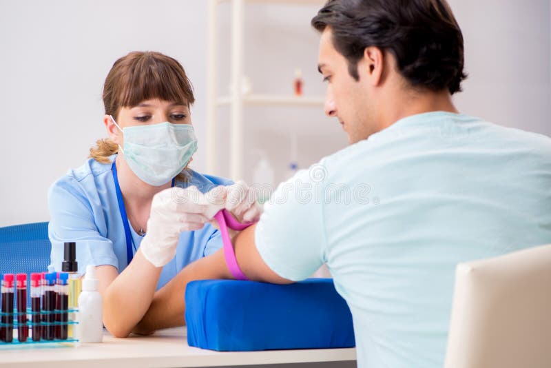 The Young Patient during Blood Test Sampling Procedure Stock Image ...