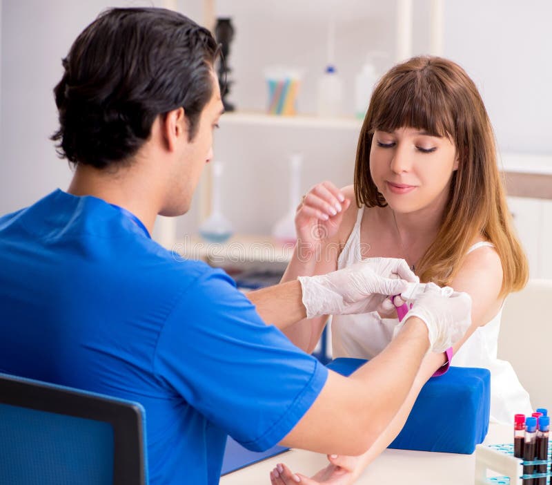 Young Patient during Blood Test Sampling Procedure Stock Photo - Image ...