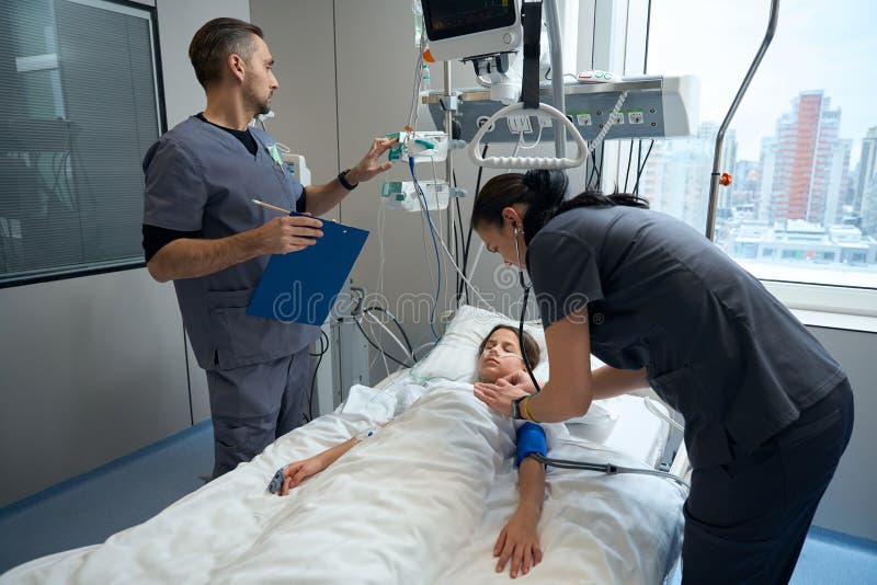 Young Patient in Intensive Care on Breathing Support Stock Photo ...