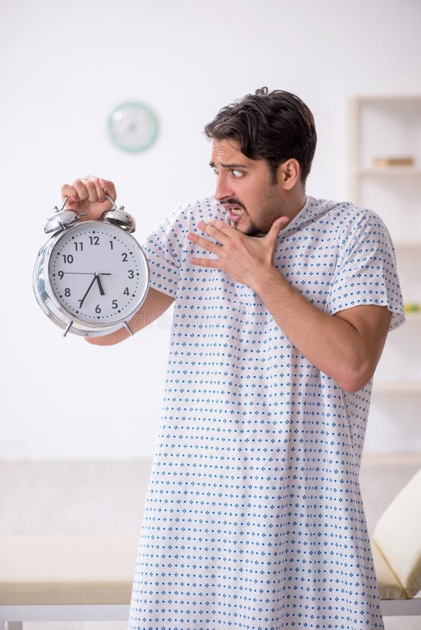 Young Male Patient in Time Management Concept Stock Photo - Image of ...