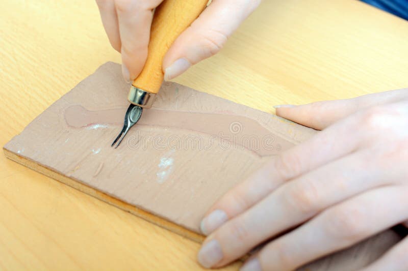Young Patient is Working with Linocut at Occupational Therapy Stock ...