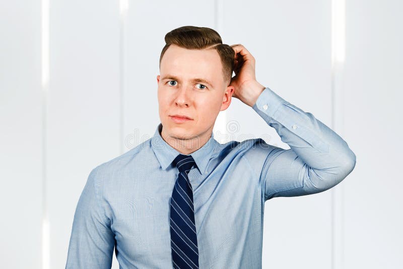 Young Pensive Guy Businessman Think, Dressed in Blue Shirt and Tie ...