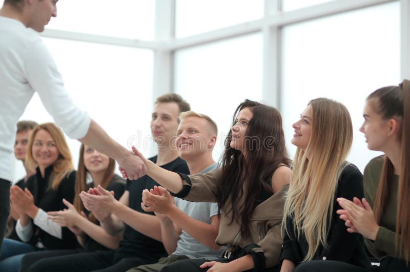 Young People Applaud at a Group Meeting. Stock Photo - Image of hand ...